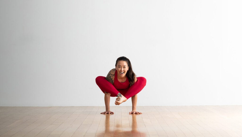 Shoulder-Pressing Pose (Bhujapidasana)