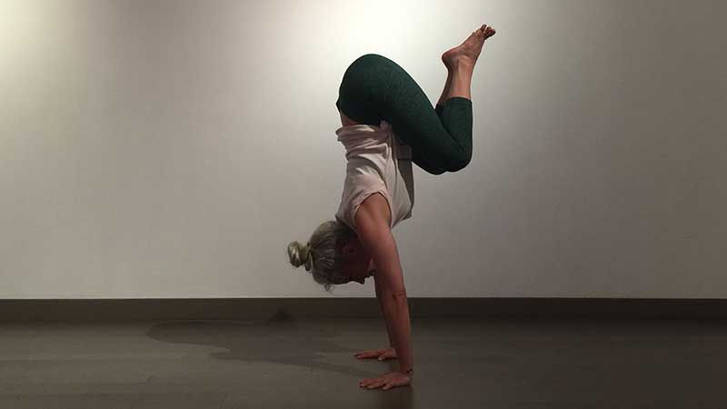Kathryn Budig Yoga Challenge Pose: Bent-Knee Handstand Pike