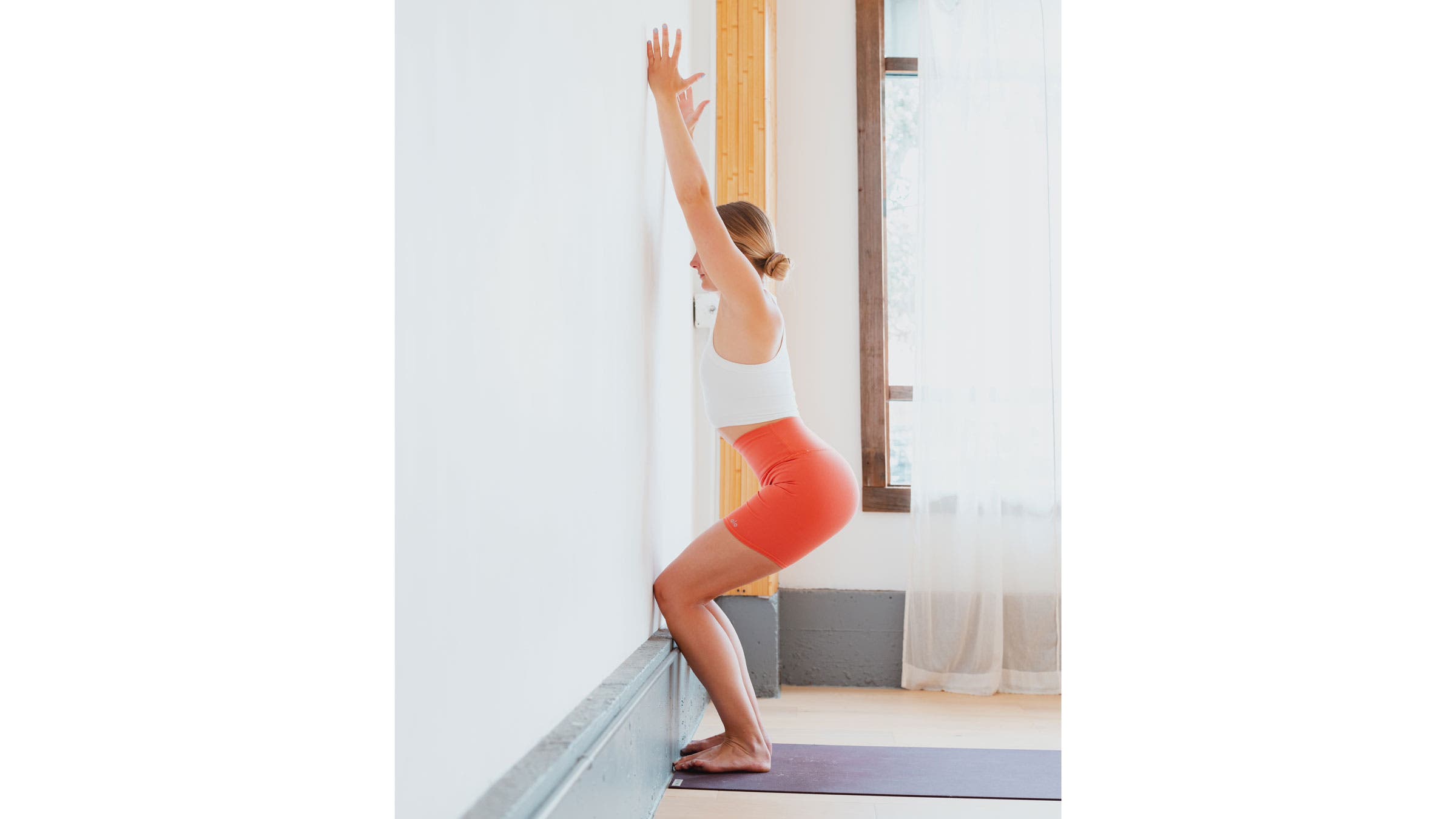 8 Common Yoga Poses That Are Easier to Teach (and Learn) at the Wall