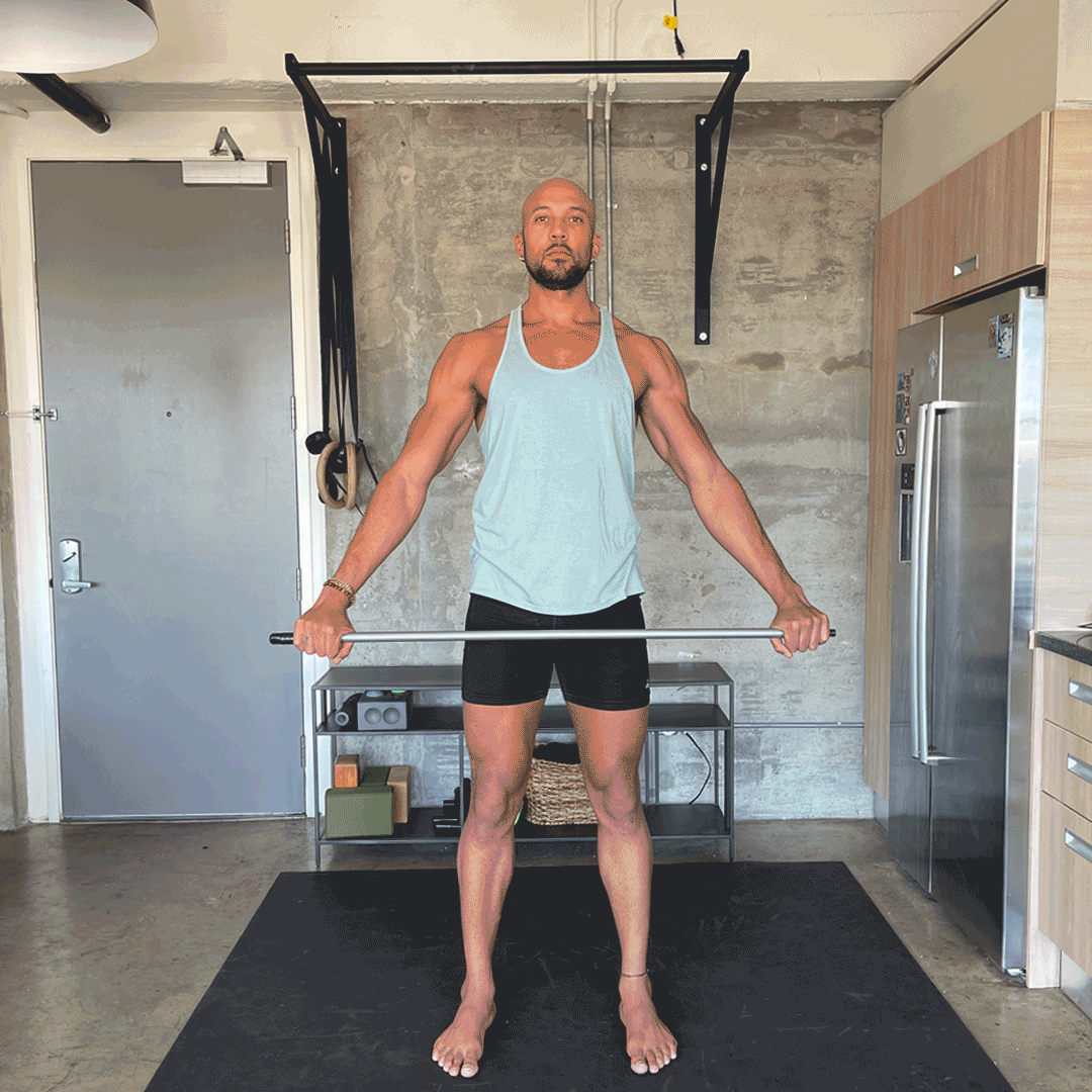 19 Ways to Use a Dowel in Yoga to Add Power to Your Practice
